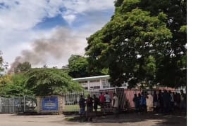 Solomon Islands riots: Torched buildings in Honiara's Chinatown still ...