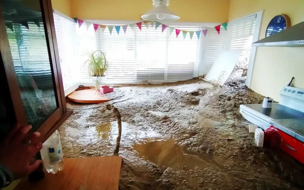 Mud hip deep in Nelson home 'heartbreaking' for young family | RNZ News