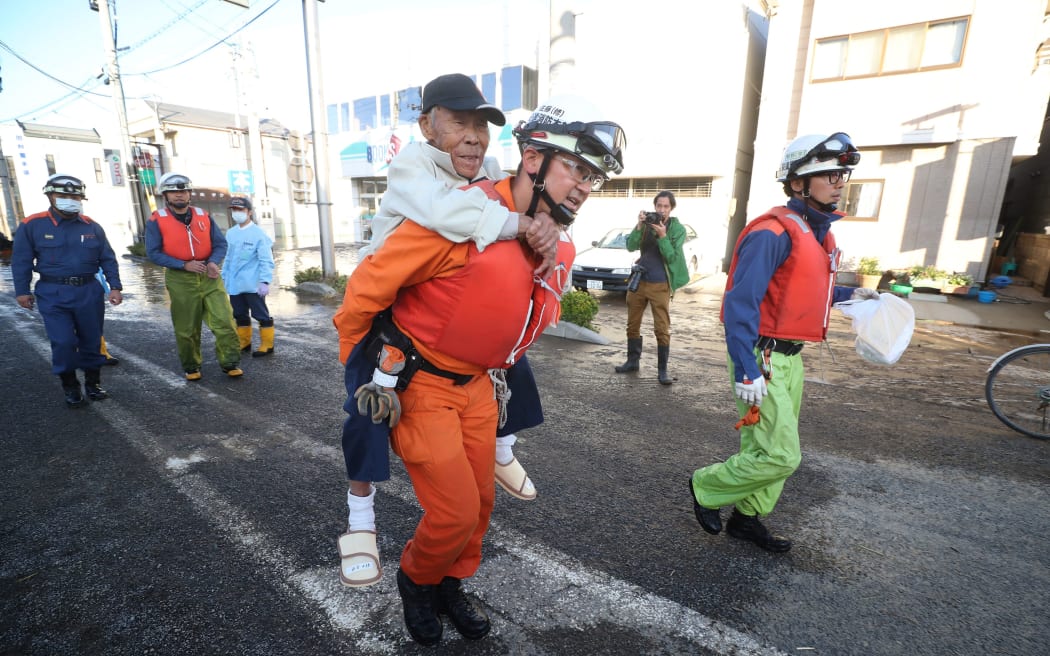 Japan sends in troops after deadly typhoon floods towns, kills 30 | RNZ ...