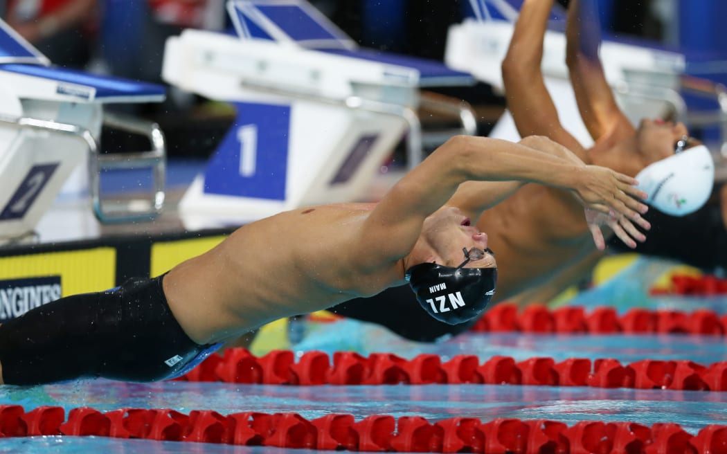 Three swimmers go under World Championship qualifying times | RNZ News