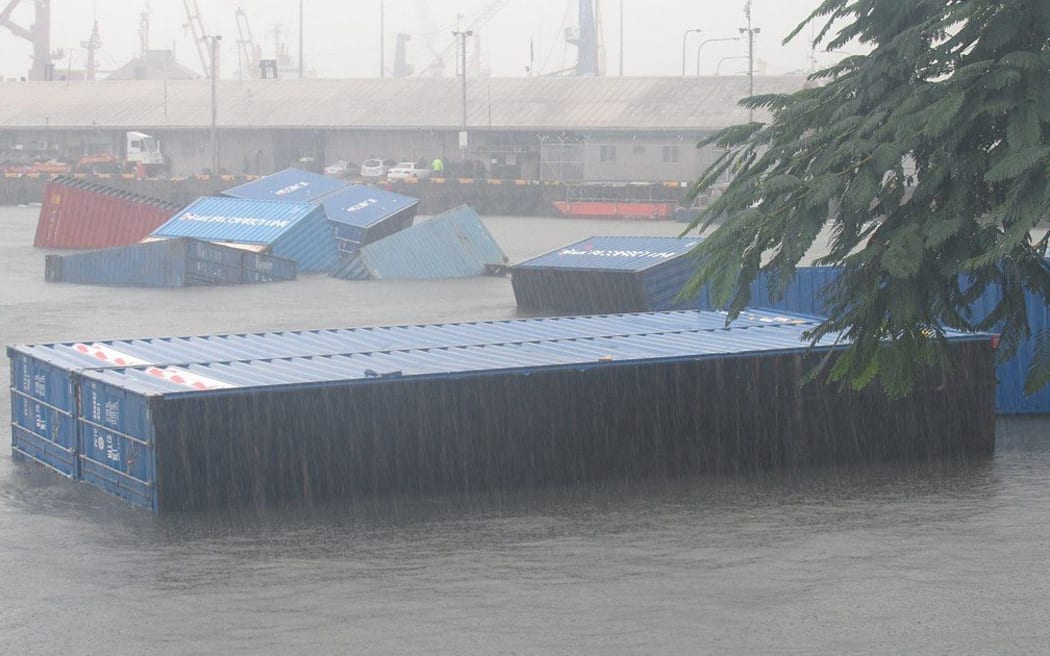 Containers floating in Fiji harbour after ship sinks | RNZ News