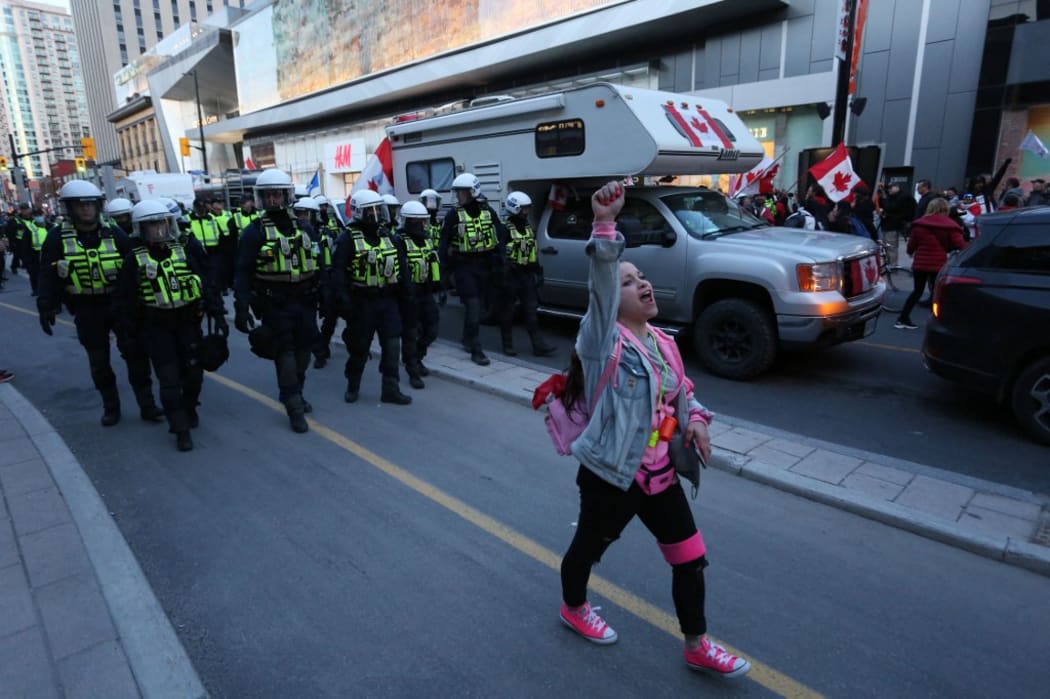 Police arrest several in Canadian capital as bikers parade turns unruly ...