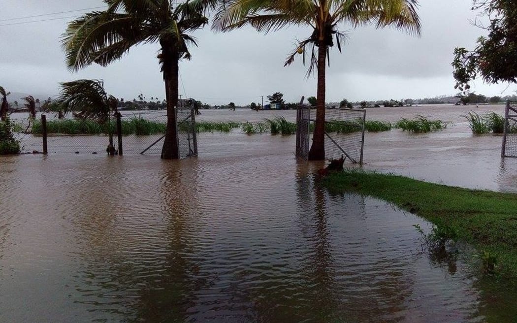 Shops left in knee-high silt after Fiji floods | RNZ News