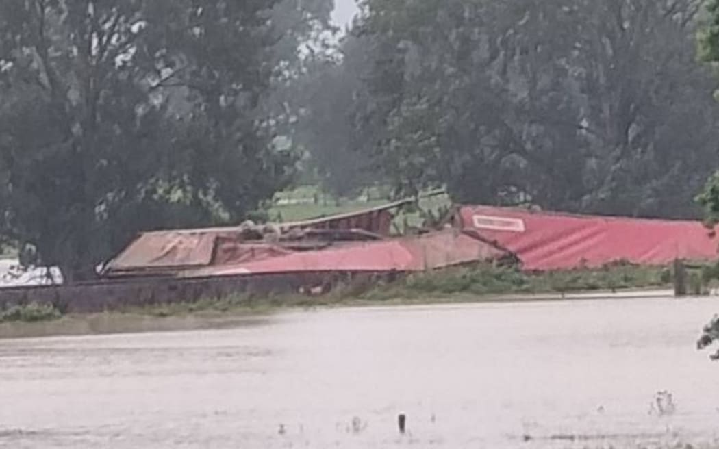 Wild weather in Bay of Plenty: Train derailed, bridge washed out ...