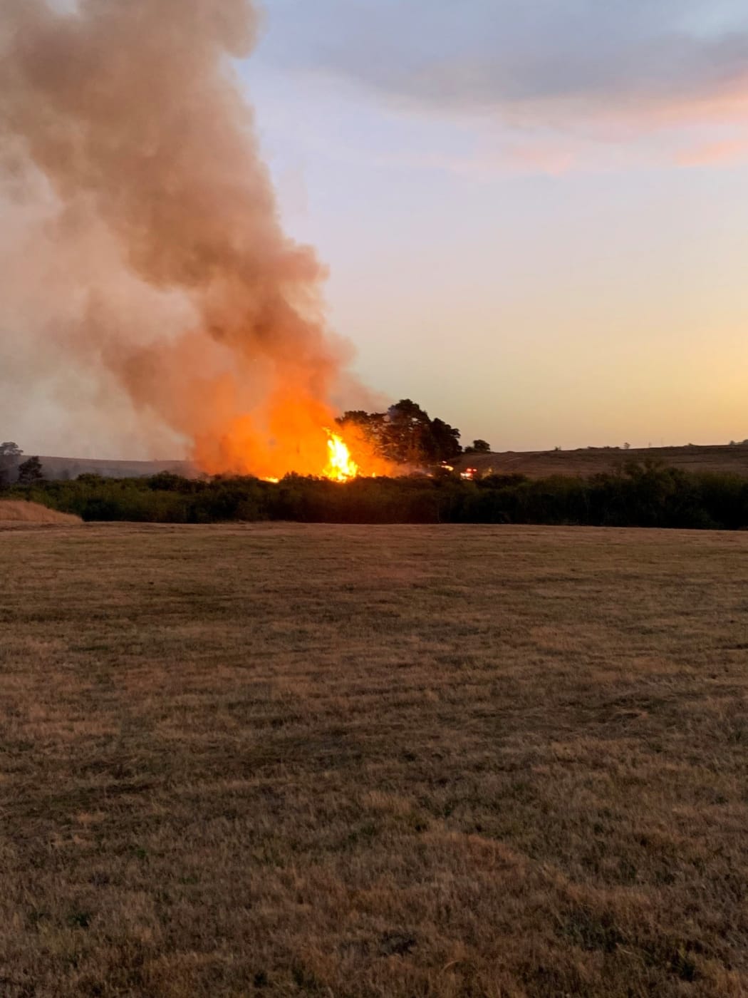 Helicopters help tackle Waikato fire which closed railway line | RNZ News