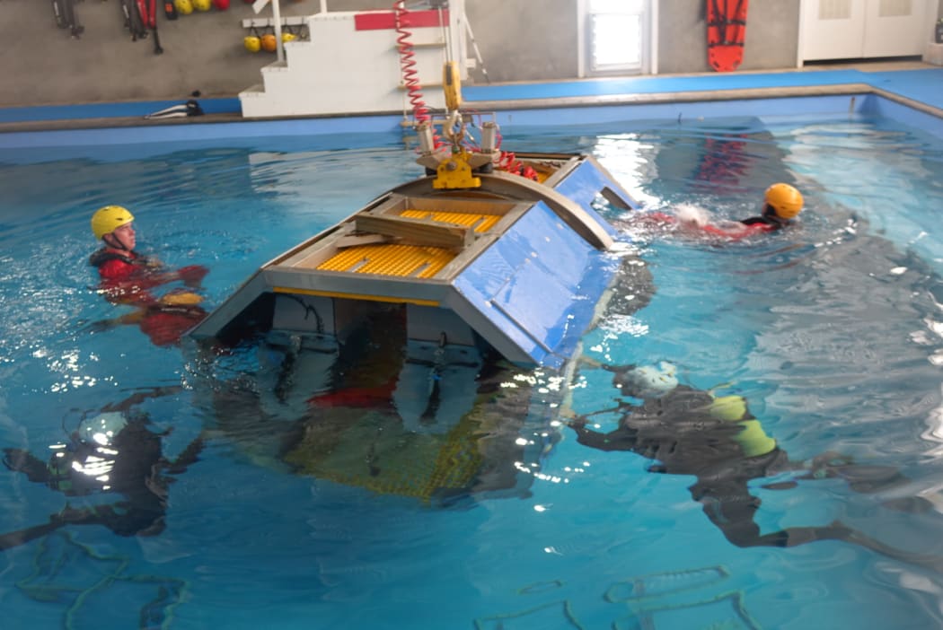 Training provider takes plunge on helicopter escape qualification | RNZ ...