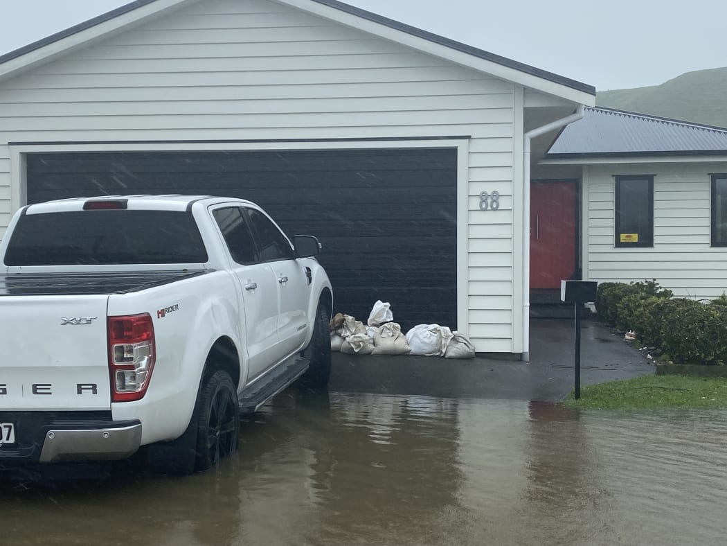 Gisborne residents race to barricade houses with sandbags before dark ...